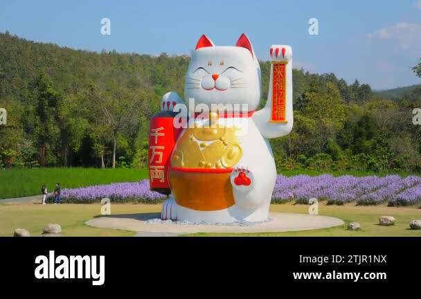 Big Statue of Beckoning cat, symbol of good fortune and prosperity in ...
