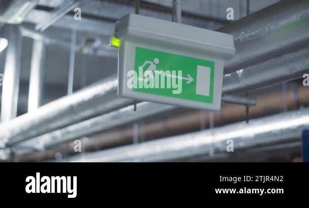 Green emergency, fire exit sign. Standard international symbol safe ...