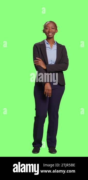 Vertical video: Full body green screen backdrop with business woman ...
