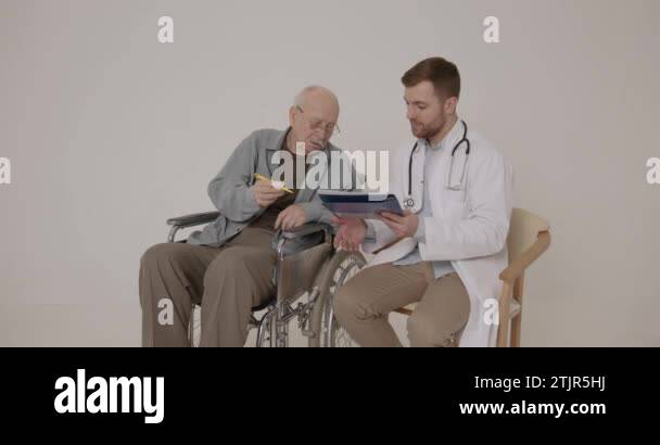 Healthcare, elderly people concept. Old man patient being examined by a ...