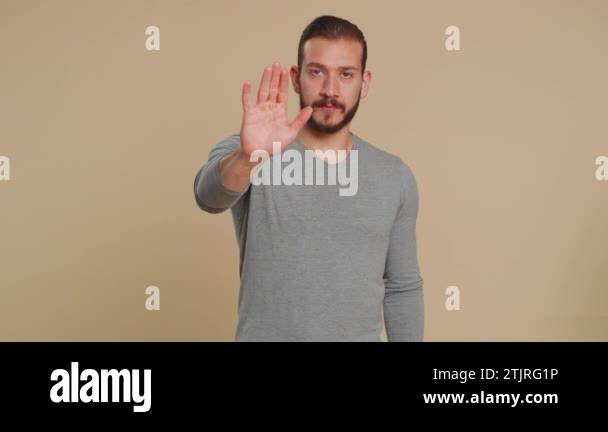 Lebanese man say No hold palm folded crossed hands in stop gesture ...