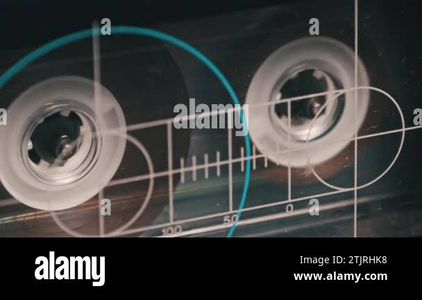 Audio tape recorder playback. Playing the transparent audio cassette ...