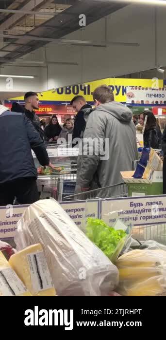 people in the supermarket at the checkout Customers in supermarket ...