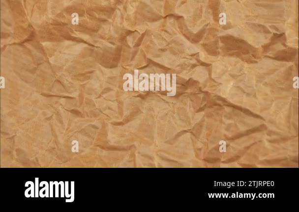 Brown, crumpled paper stop motion animation empty background with free ...