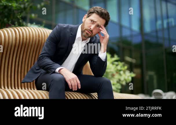 Depressed man businessman employee entrepreneur in a formal suit ...