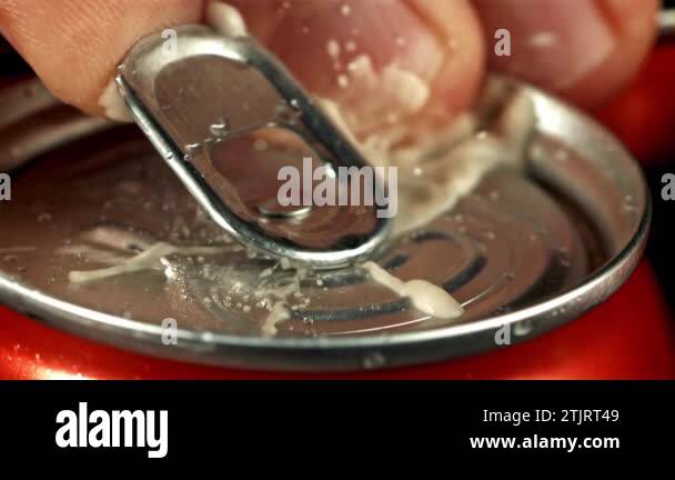 Opening can of cola with splashes. Filmed is slow motion 1000 fps. High ...