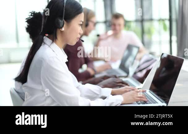 Executive female operator working headset Stock Videos & Footage - HD and 4K Video Clips - Alamy