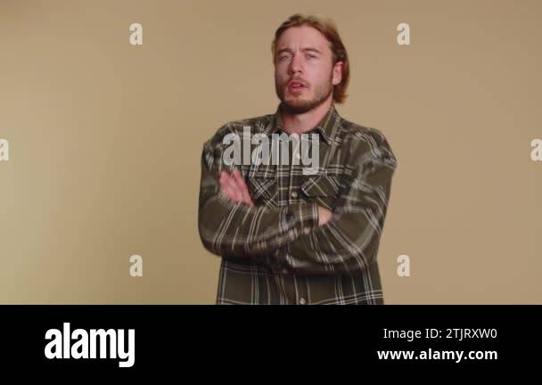Dissatisfied man shaking head no, asking reason of failure, expressing ...