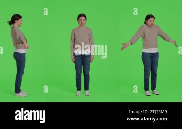 Doubtful girl doing i dont know sign in studio, acting clueless and ...