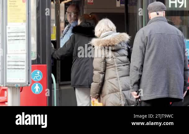 London, UK - 2022.12.02: Slow motion footage of People boarding a ...