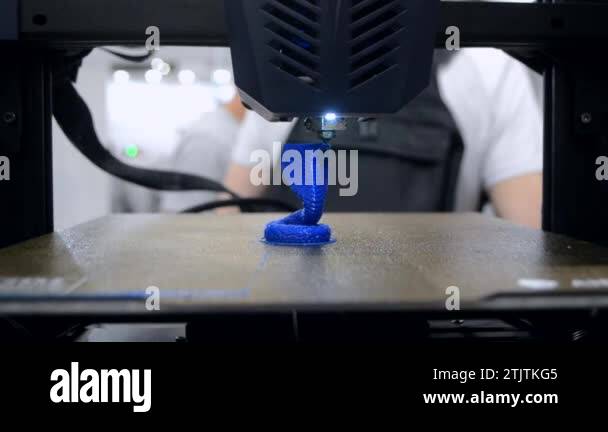 Abstract object printing on 3D printer with molten plastic close-up. 3D ...