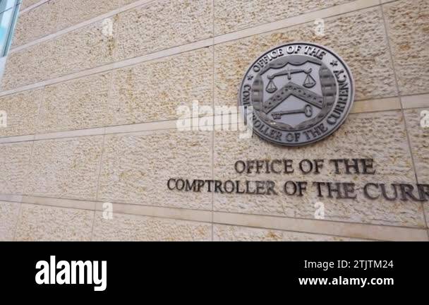 The Seal of the Office of the Comptroller of the Currency on its ...