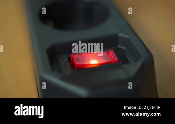 Turn off power supply by pressing red push-button switch of black ...