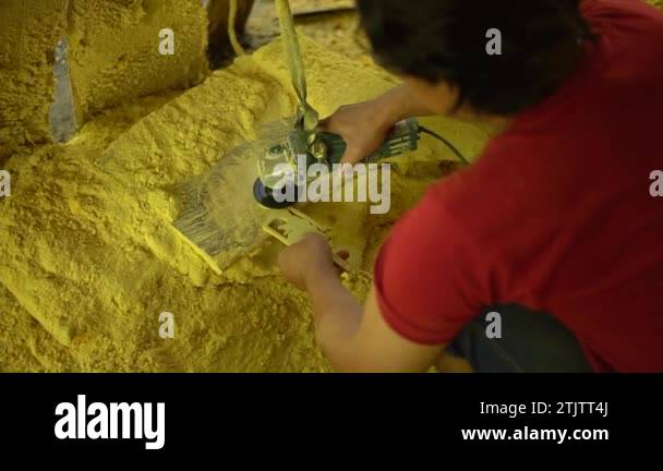 Professional artisans are making traditional Javanese wooden dolls ...