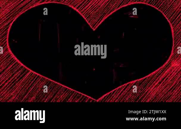 Red frame in the shape of a heart with scratches on a black screen ...