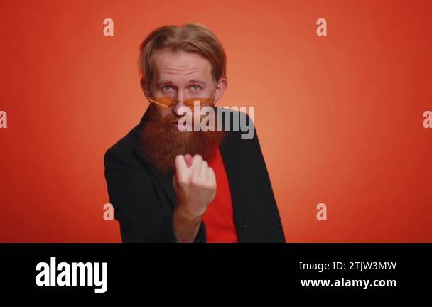 Greedy avaricious young man showing fig negative gesture, you dont get ...
