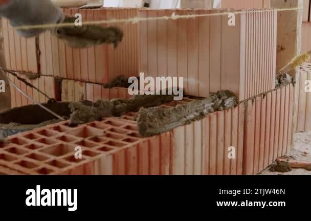 Mason builds wall building Stock Videos & Footage - HD and 4K Video ...