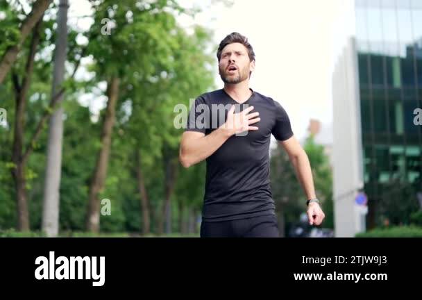 A man is running on a track when he suddenly starts to experience chest ...