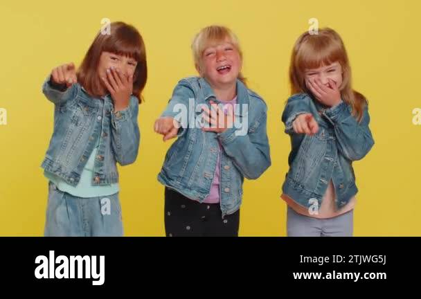 Teenage girls laughing out loud after hearing ridiculous anecdote ...