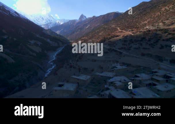 Aerial fly over old Khangshar village houses in Manang district ...