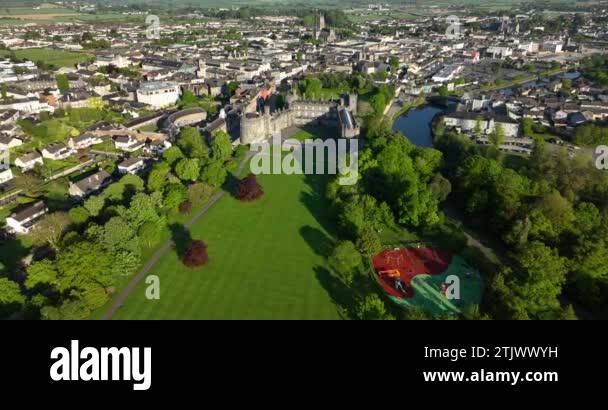 Arial. A flight towards Kilkenny Castle, through the green parkland of ...
