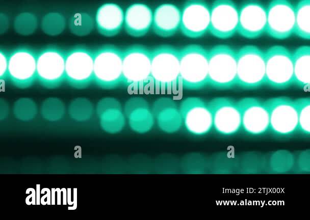 Lines of round Turquoise bokeh move horizontally. Abstract moving ...