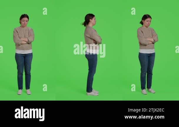 Discontent upset woman acting sad and discouraged posing over ...