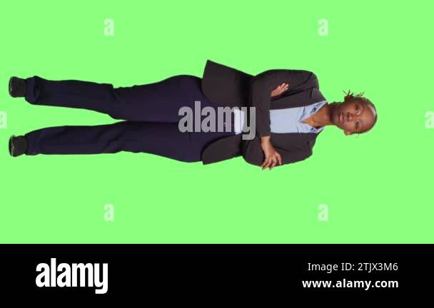Vertical video: Full body greenscreen backdrop of office manager ...