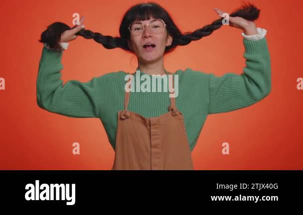 Funny joyful sincere adult woman 30 years old in sweater making playful ...