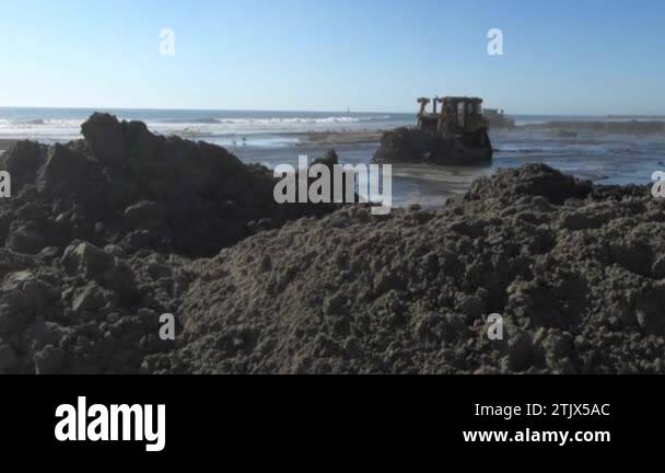 Pushing sand Stock Videos & Footage - HD and 4K Video Clips - Alamy