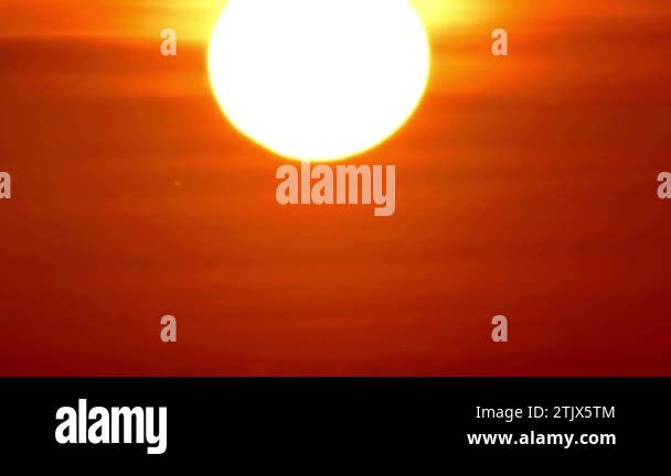 Celestial Symphony: Time-Lapse of the Setting Sun Painting the Horizon ...