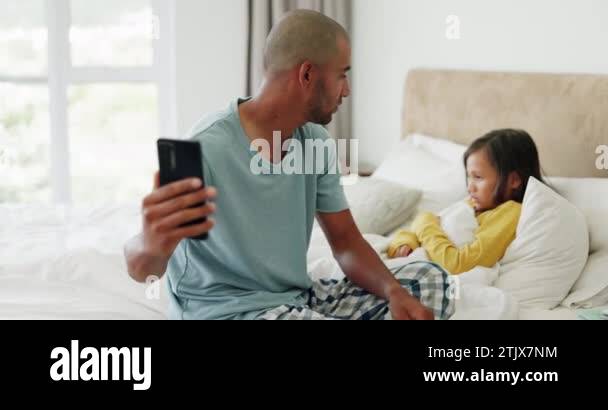 Video call, fever and a father with a sick child, talking on a phone ...