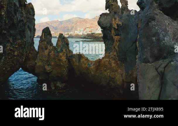 Natural swimming pool of Devil. Aerial flight walk through dangerous ...