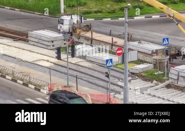 Loader crane for loading and unloading concrete plates from oversized ...