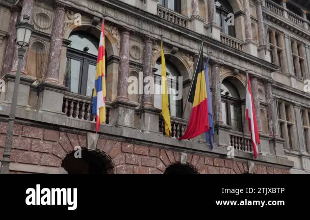 Flags of various European countries and European Union waving in front ...