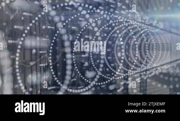 Animation of dots forming spiral, lens flare, graph and digits over back panel of server machine ...