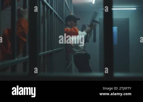 Male prisoner strangles prison officer through metal bars, takes keys ...