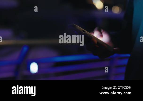 Close View of the Male Hand Holding, Using Smartphone Outside at Night ...