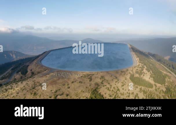 Elevated storage water reservoir pumped water hydro power plant ...