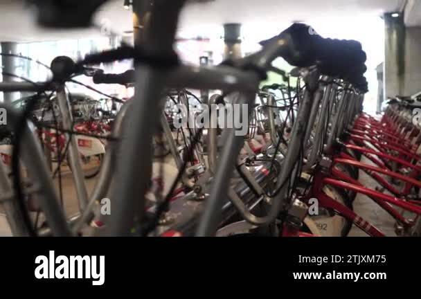 Red city bikes Stock Videos & Footage - HD and 4K Video Clips - Alamy
