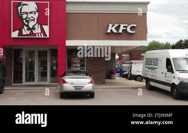 kfc kentucky fried chicken front entrance with logo and colonel sanders ...