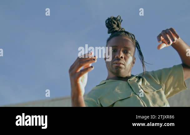 Graceful man moving arms at street closeup. Passion guy dancing hands ...