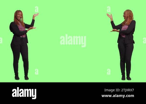 Female model advertising icon over green screen backdrop, full body on ...