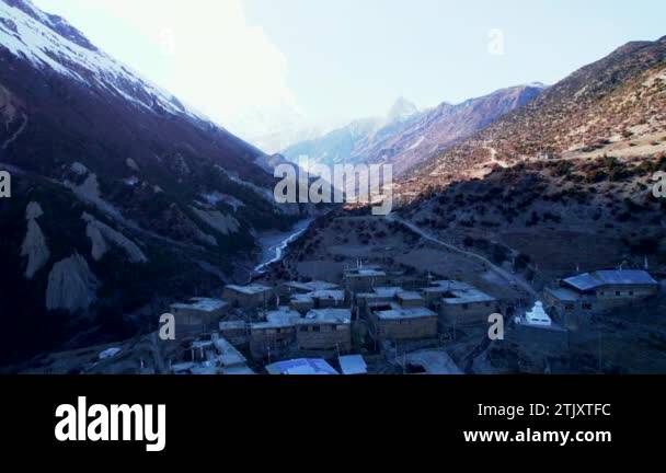 Aerial revealing backwards view colorful traditional nepals Khangshar ...