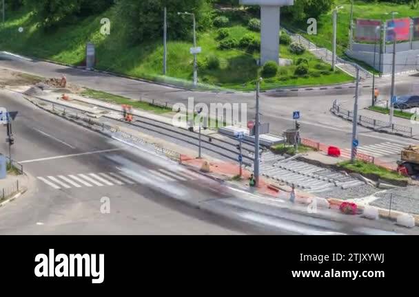 Repair works on the street aerial timelapse. Laying of new tram rails ...
