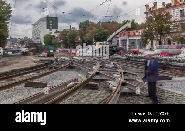 Repair works on the street intersection timelapse. Laying of new tram ...