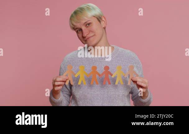 Woman showing multiracial different skin color human shape cut out of ...