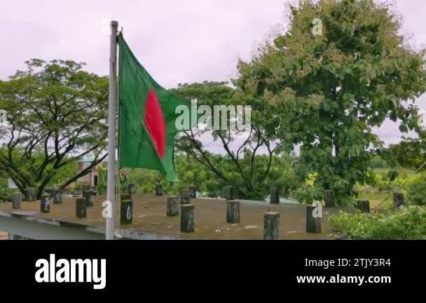 The official flag of Bangladesh is flying in the school playground. The ...