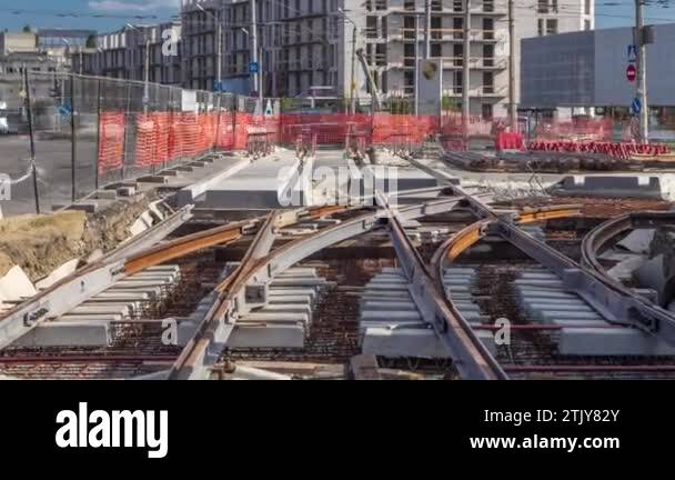 Repair works on the street timelapse. Laying of new tram rails on a ...