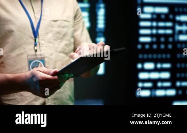 It Specialist Walking Through Operational Server Rows In Computer Network Security Data Center